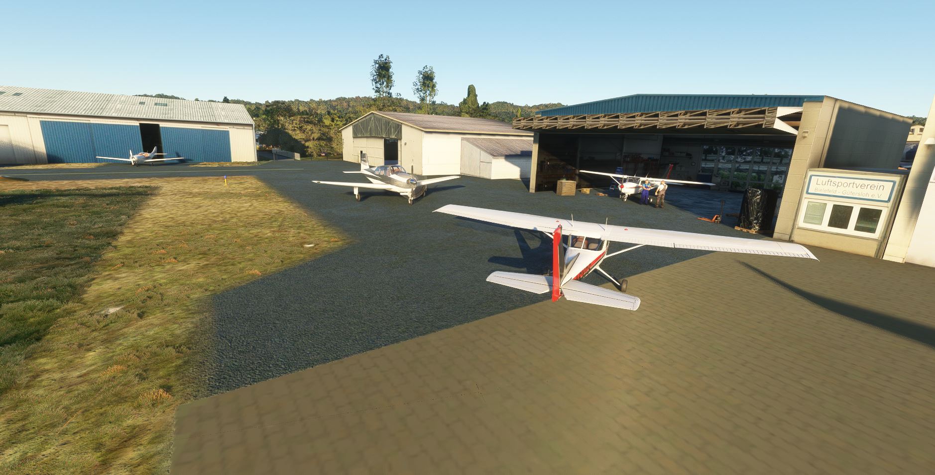 Hangar with animated bifold door for Microsoft Flight Simulator | MSFS